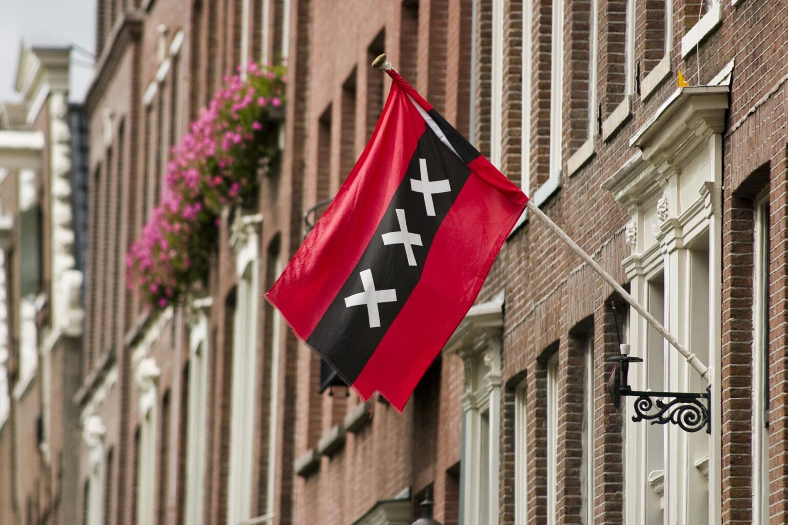 What is the meaning of the Amsterdam flag?